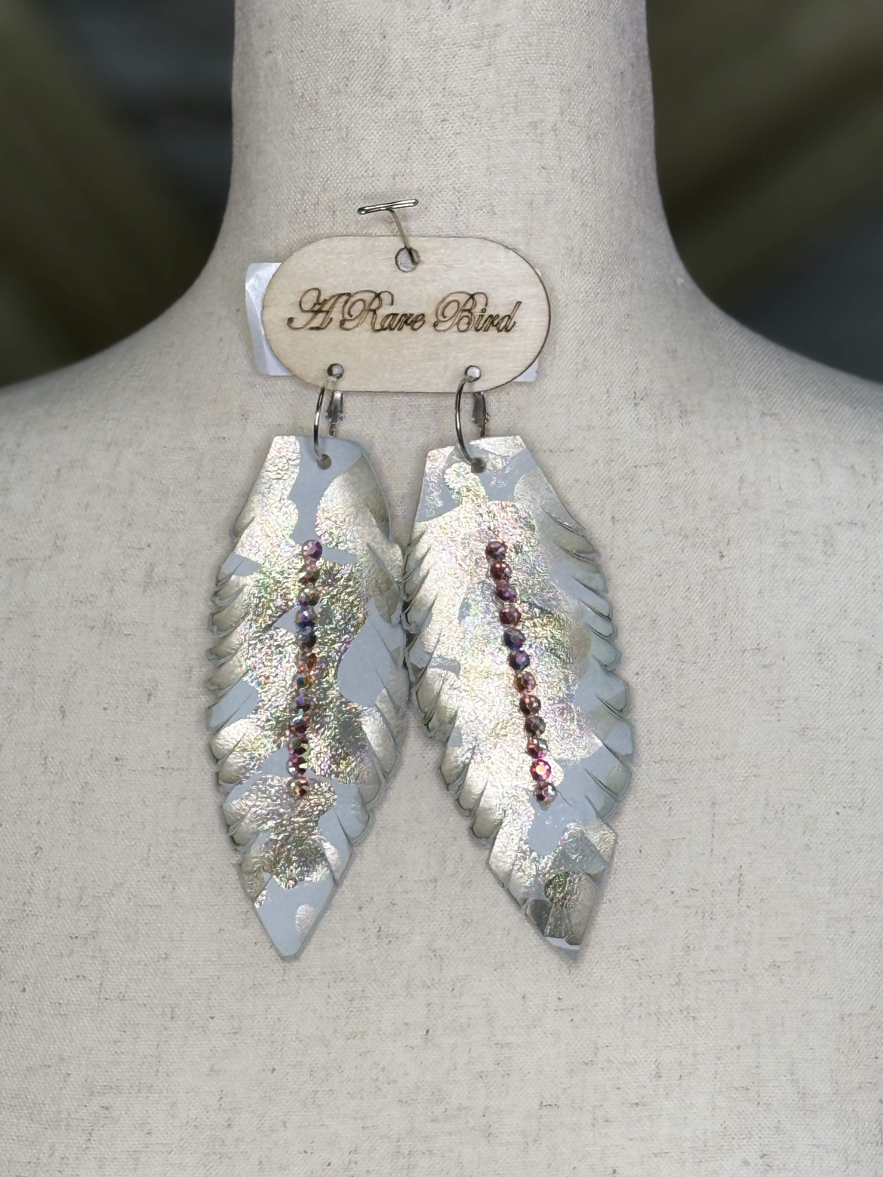 A rare bird leather feather – Felecia Bella